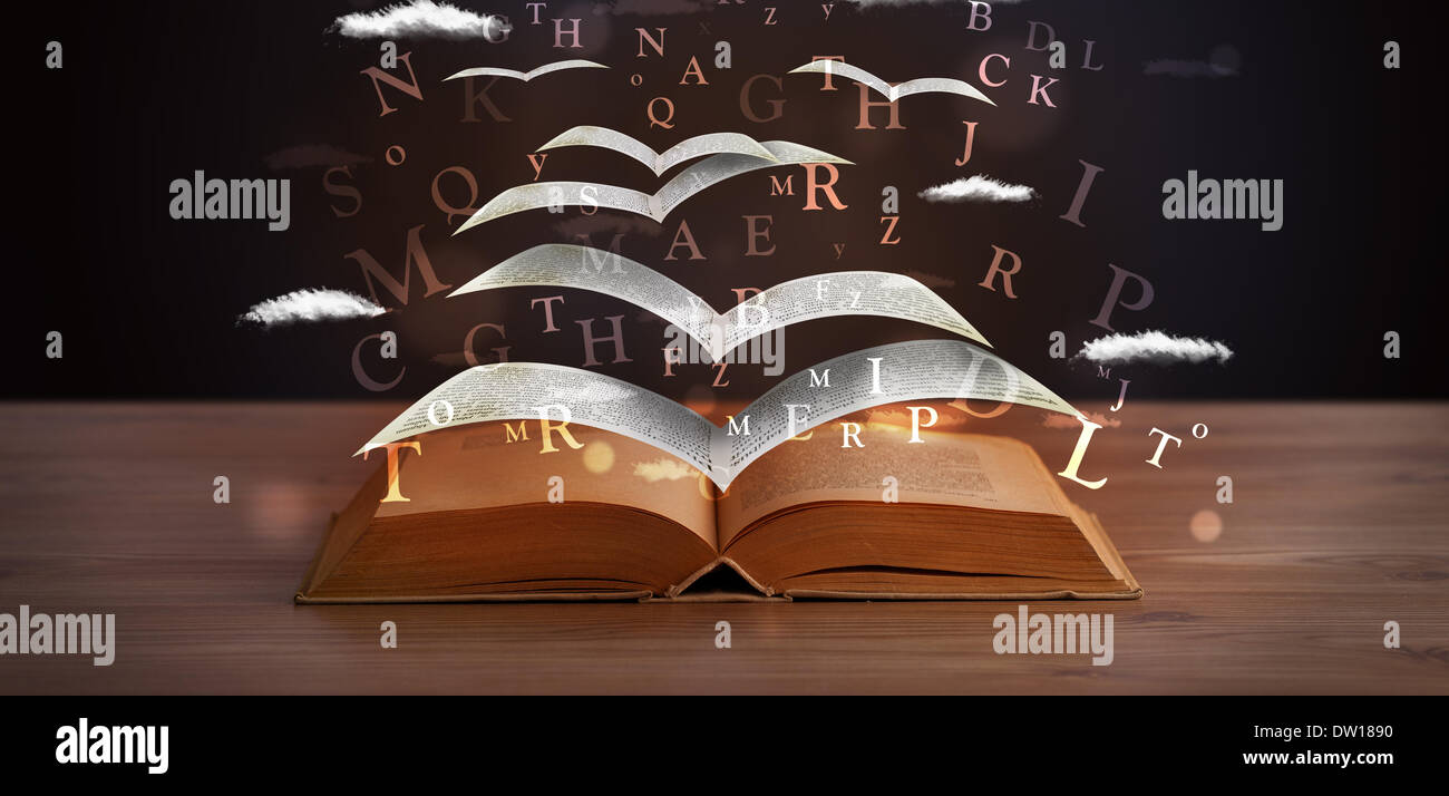 Pages and glowing letters flying out of a book Stock Photo - Alamy