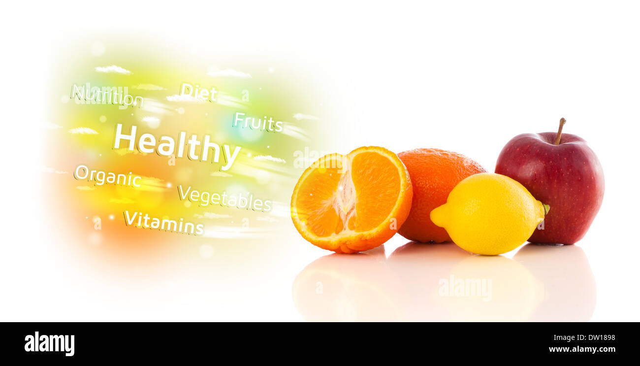 Colorful juicy fruits with healthy text and signs Stock Photo - Alamy