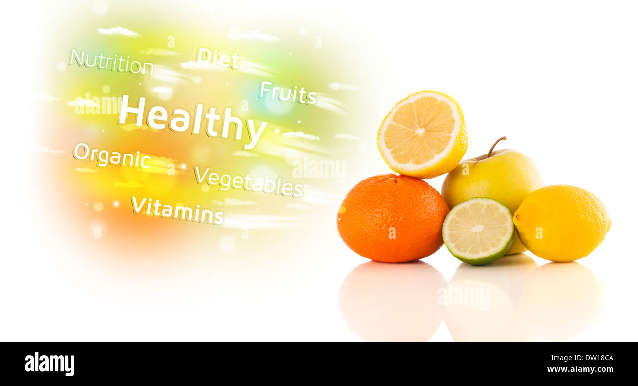 Colorful juicy fruits with healthy text and signs Stock Photo - Alamy