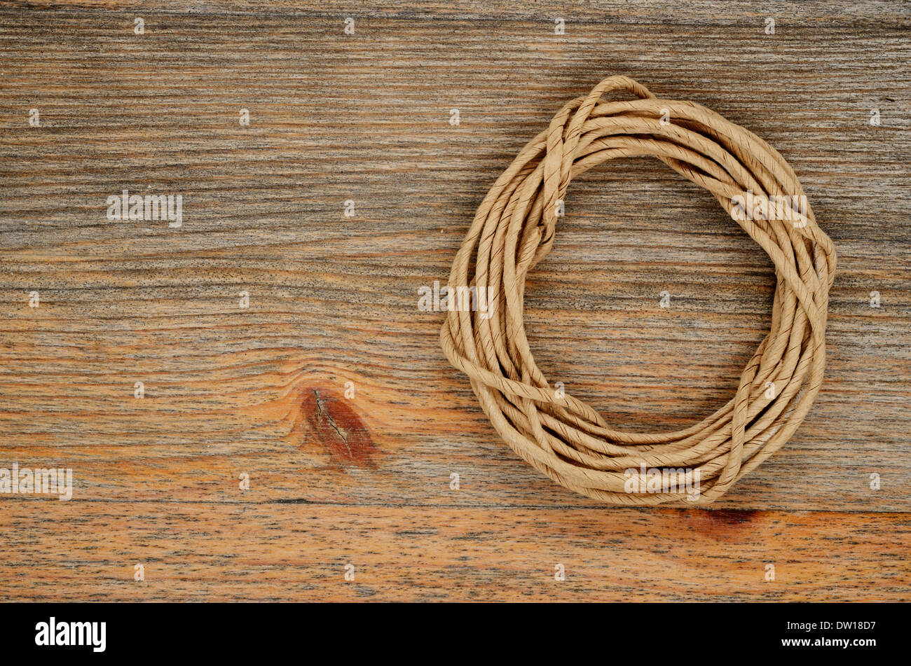 oval hank of packthread over wooden background Stock Photo - Alamy