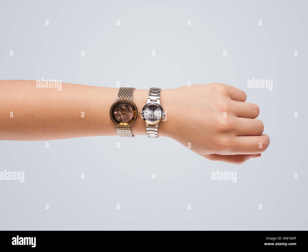 Hand with watch showing precise time Stock Photo - Alamy