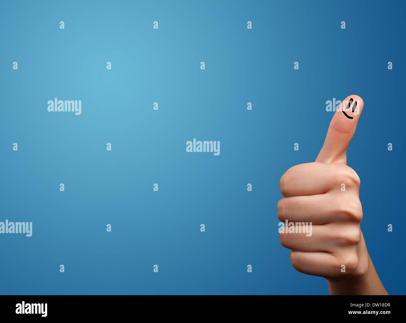 Happy smiley face fingers looking at empty blue background copy space ...