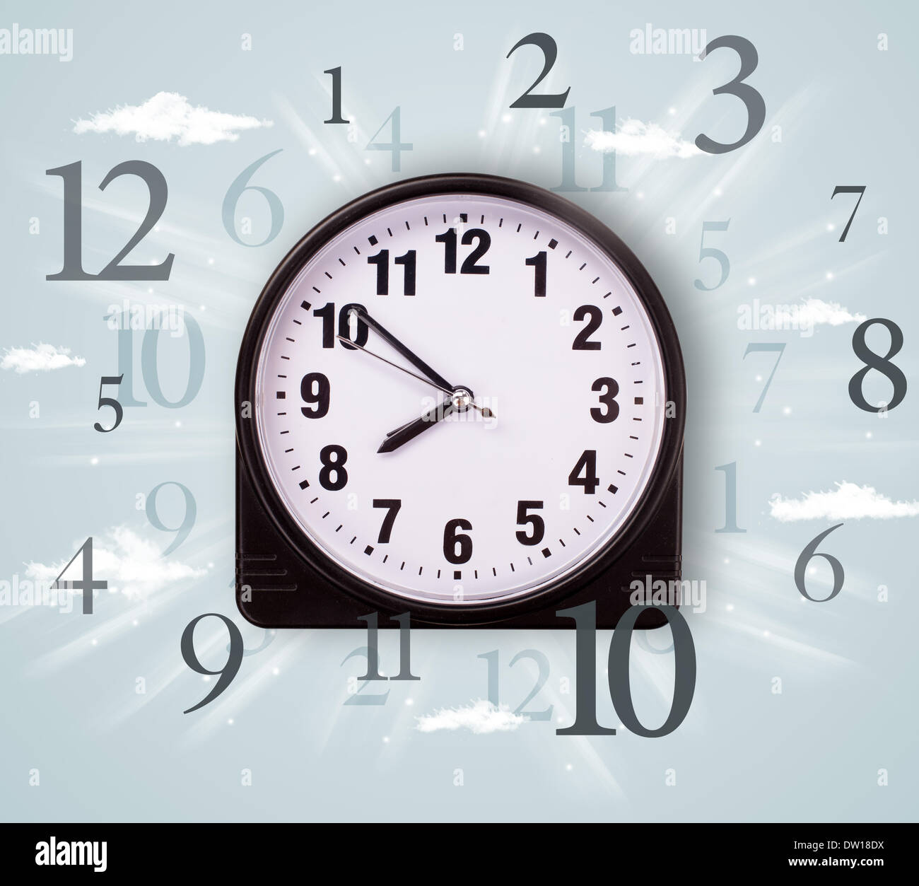 Modern clock with numbers on the side Stock Photo - Alamy
