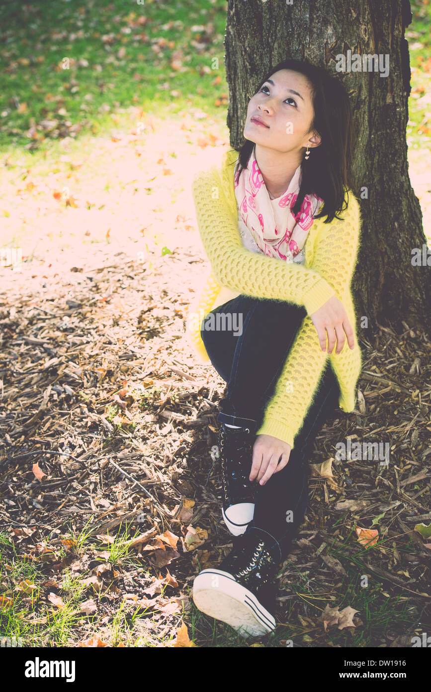 Against tree base hi-res stock photography and images - Alamy