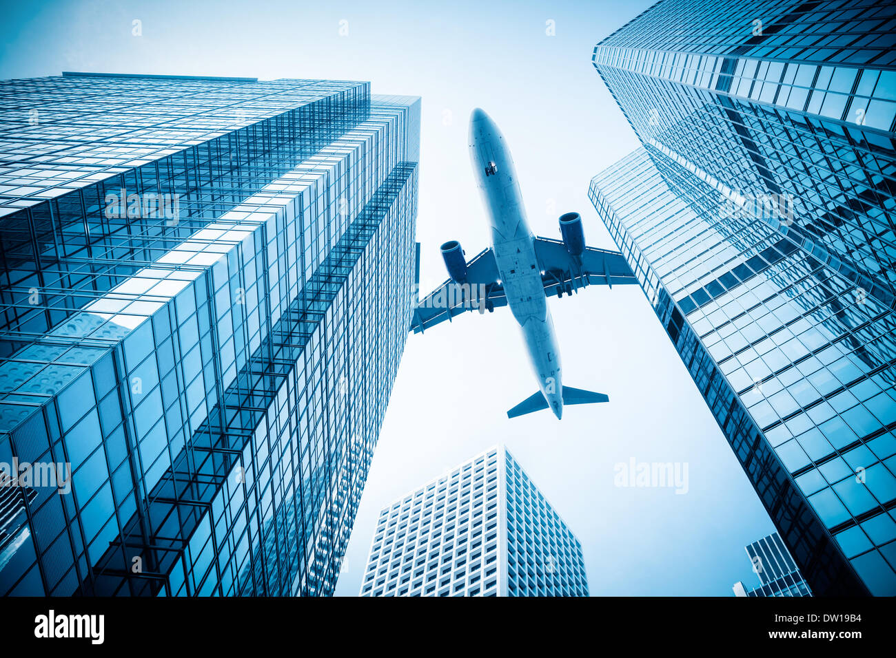 airplane and modern office building Stock Photo - Alamy