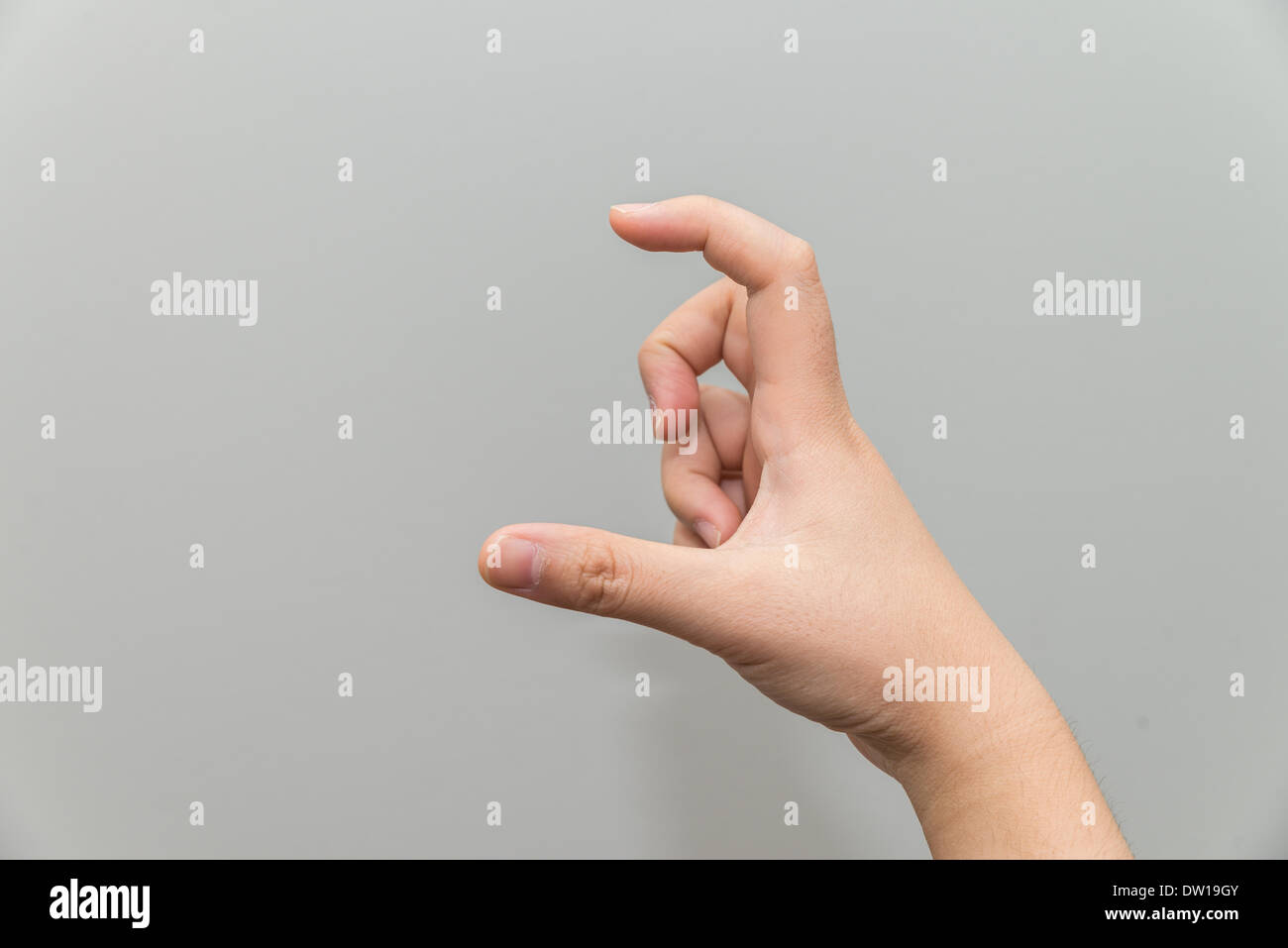 Hand holding imaginary card Stock Photo - Alamy