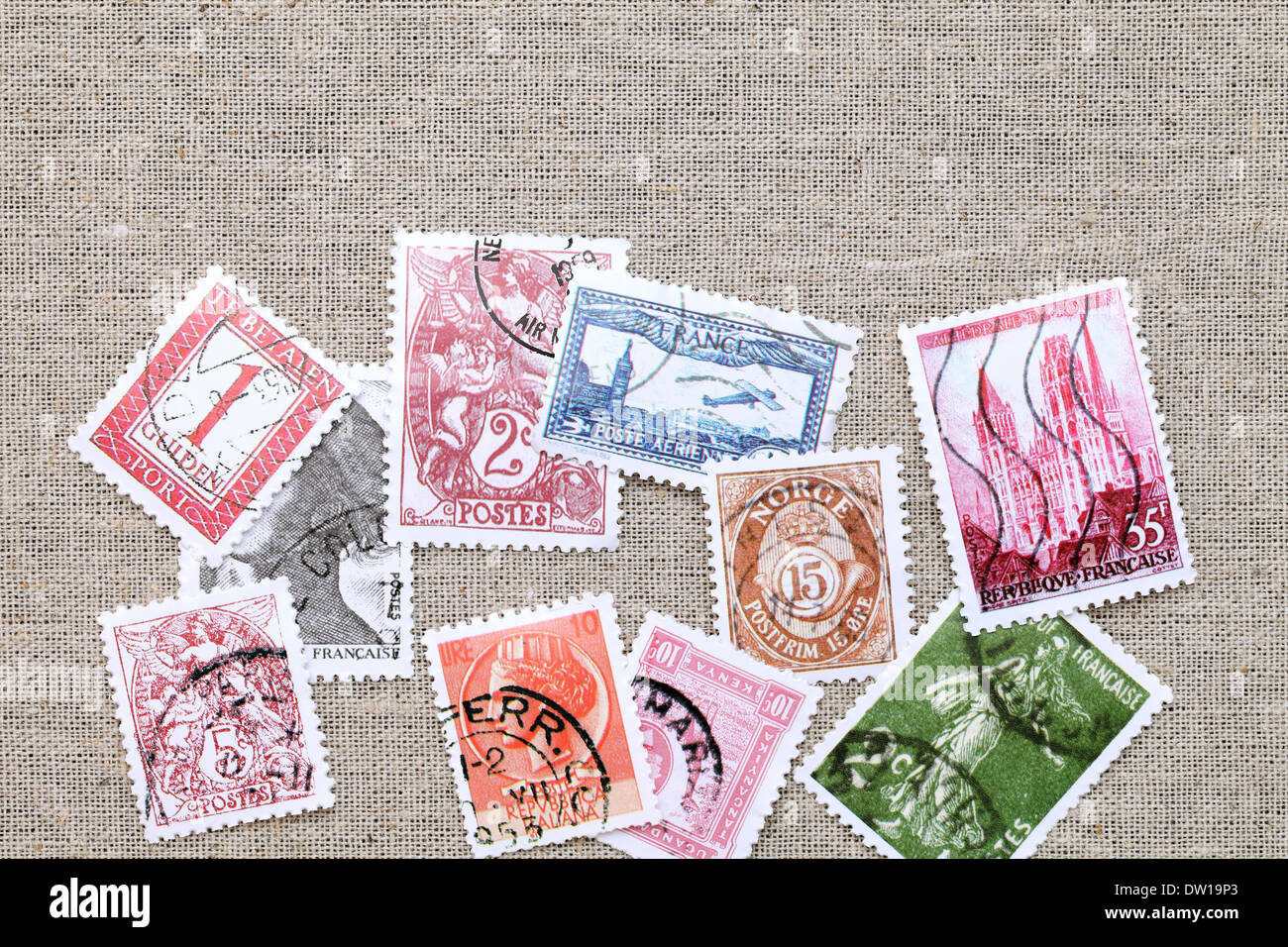 postage stamps on burlap background Stock Photo - Alamy