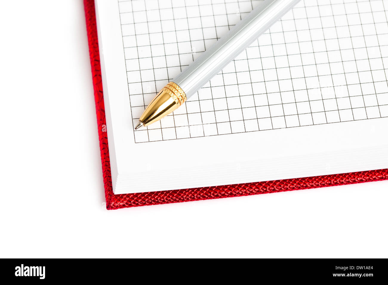 red notebook with silver pen Stock Photo - Alamy
