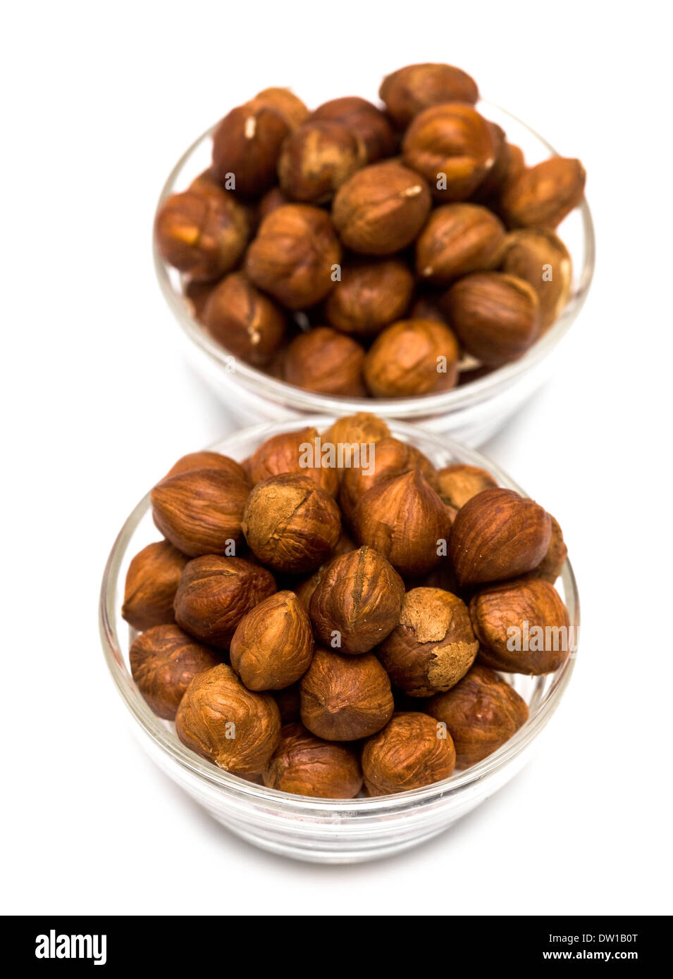 many hazelnuts in glass bowls Stock Photo - Alamy