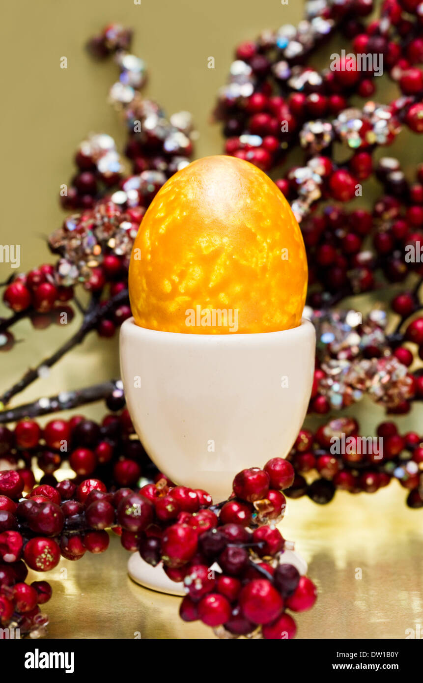 Easter egg with red berries Stock Photo - Alamy