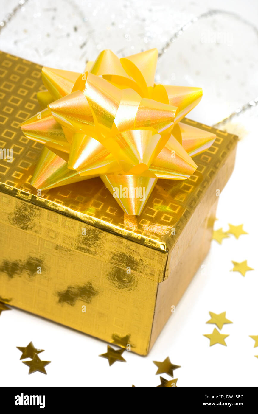 golden gift box with stars Stock Photo - Alamy