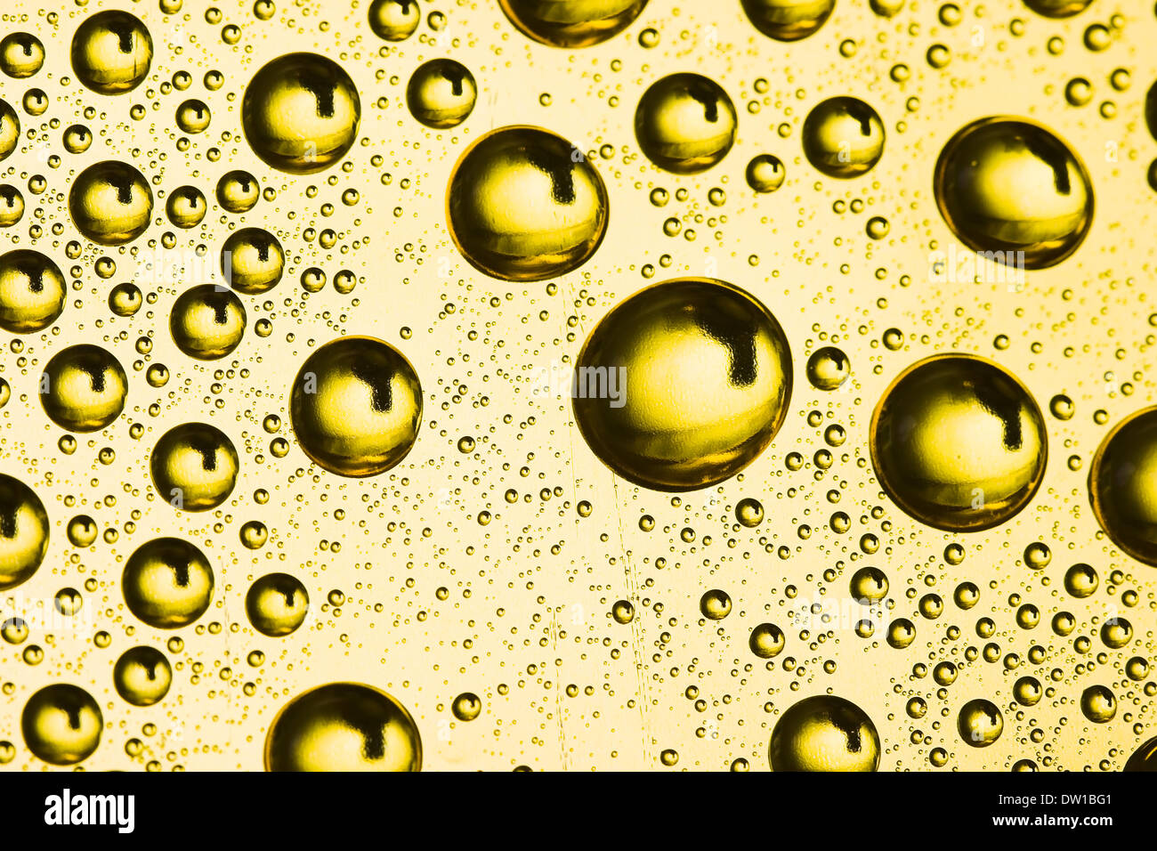 yellow water drop for background Stock Photo - Alamy