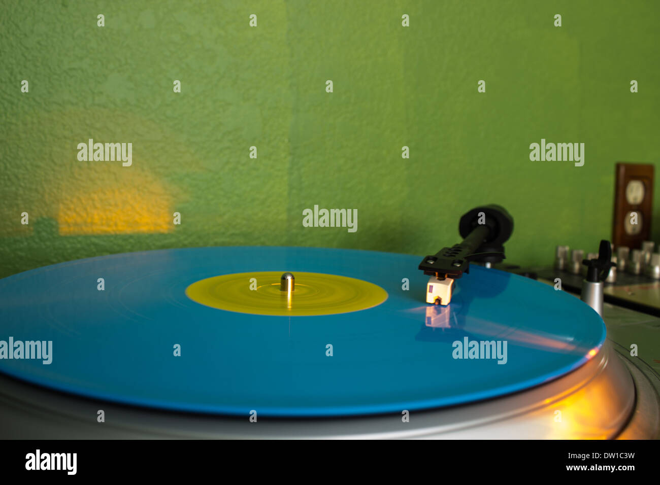 DJ turntable with a record spinning on it Stock Photo - Alamy
