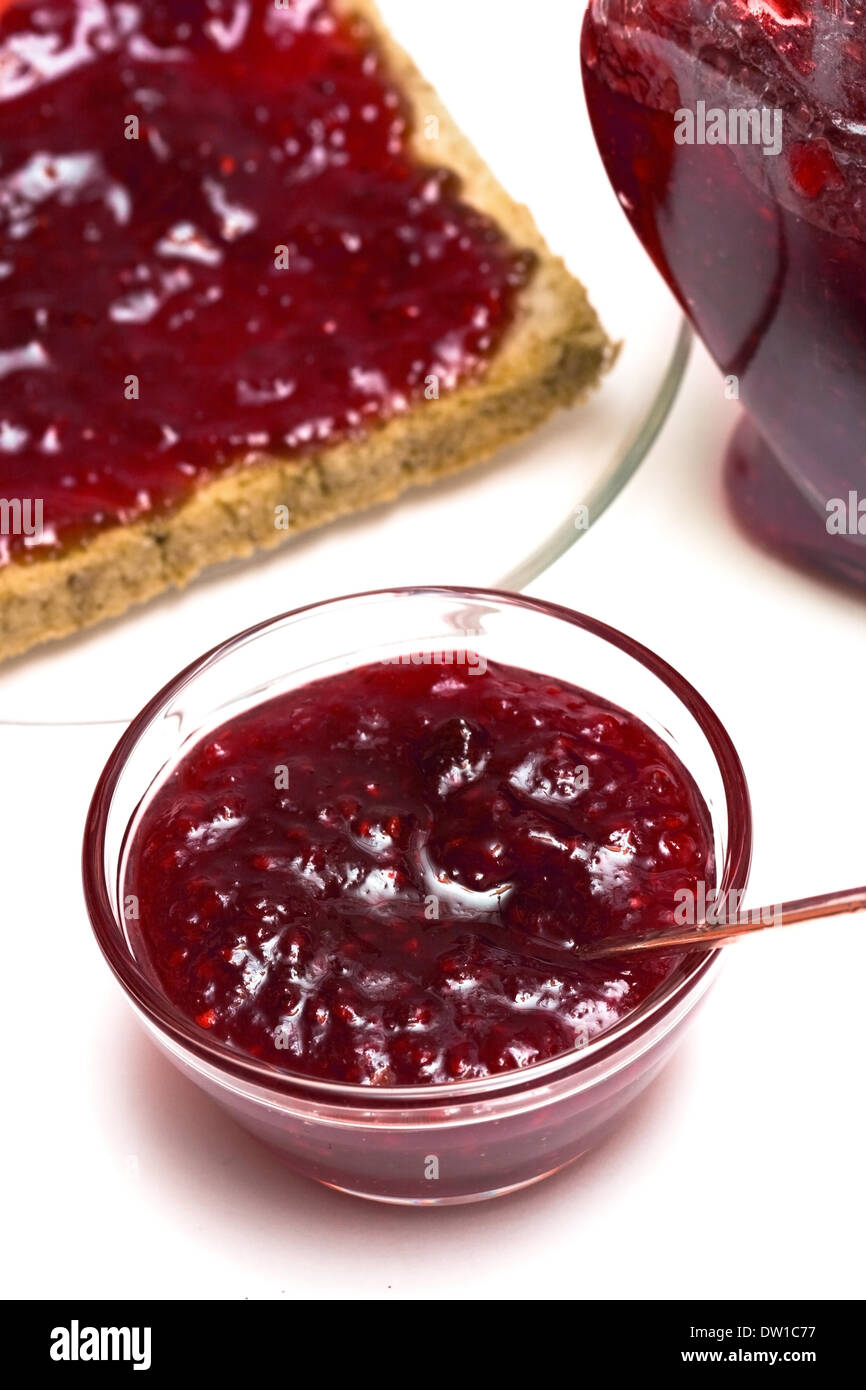 Breakfast of raspberry jam on toast Stock Photo - Alamy