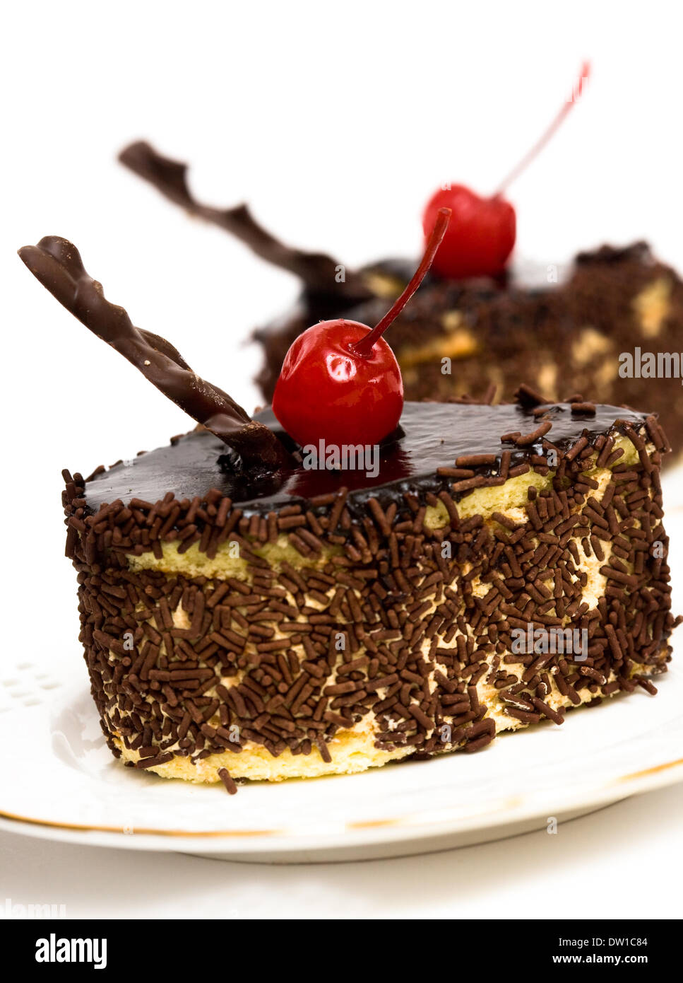 chocolate cakes with red cherry Stock Photo - Alamy