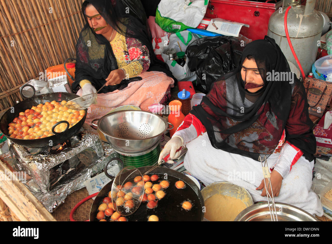 United Arab Emirates, Dubai, Heritage Village, women, cooking Stock ...