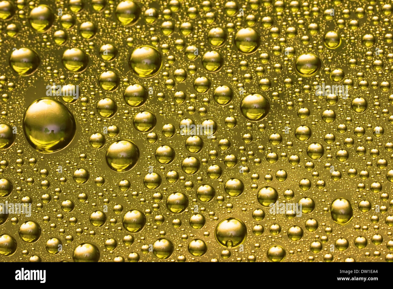 yellow water drop for background Stock Photo - Alamy