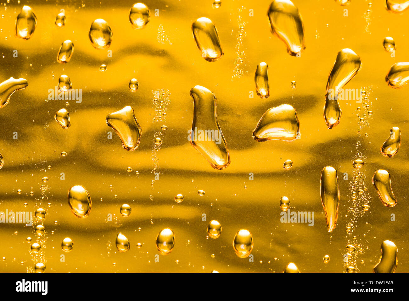 golden water drop for background Stock Photo - Alamy