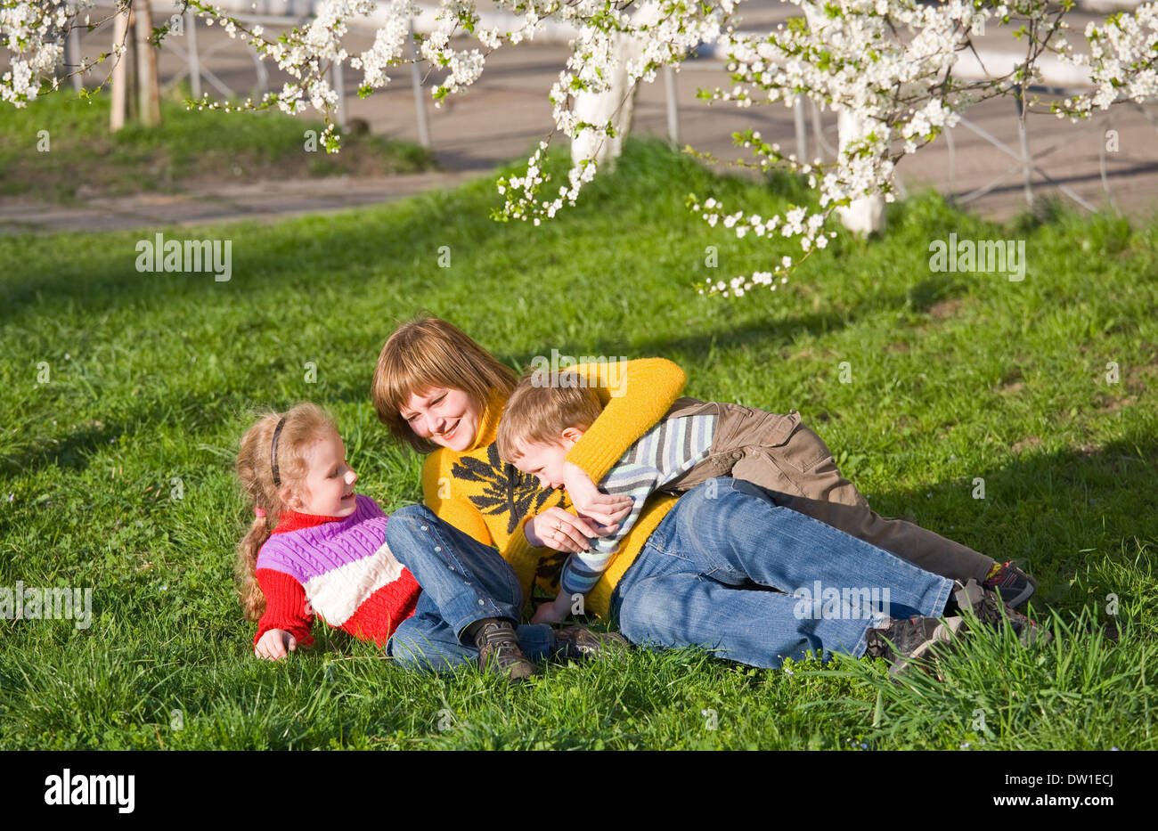 Happy family in courtyard hi-res stock photography and images - Alamy