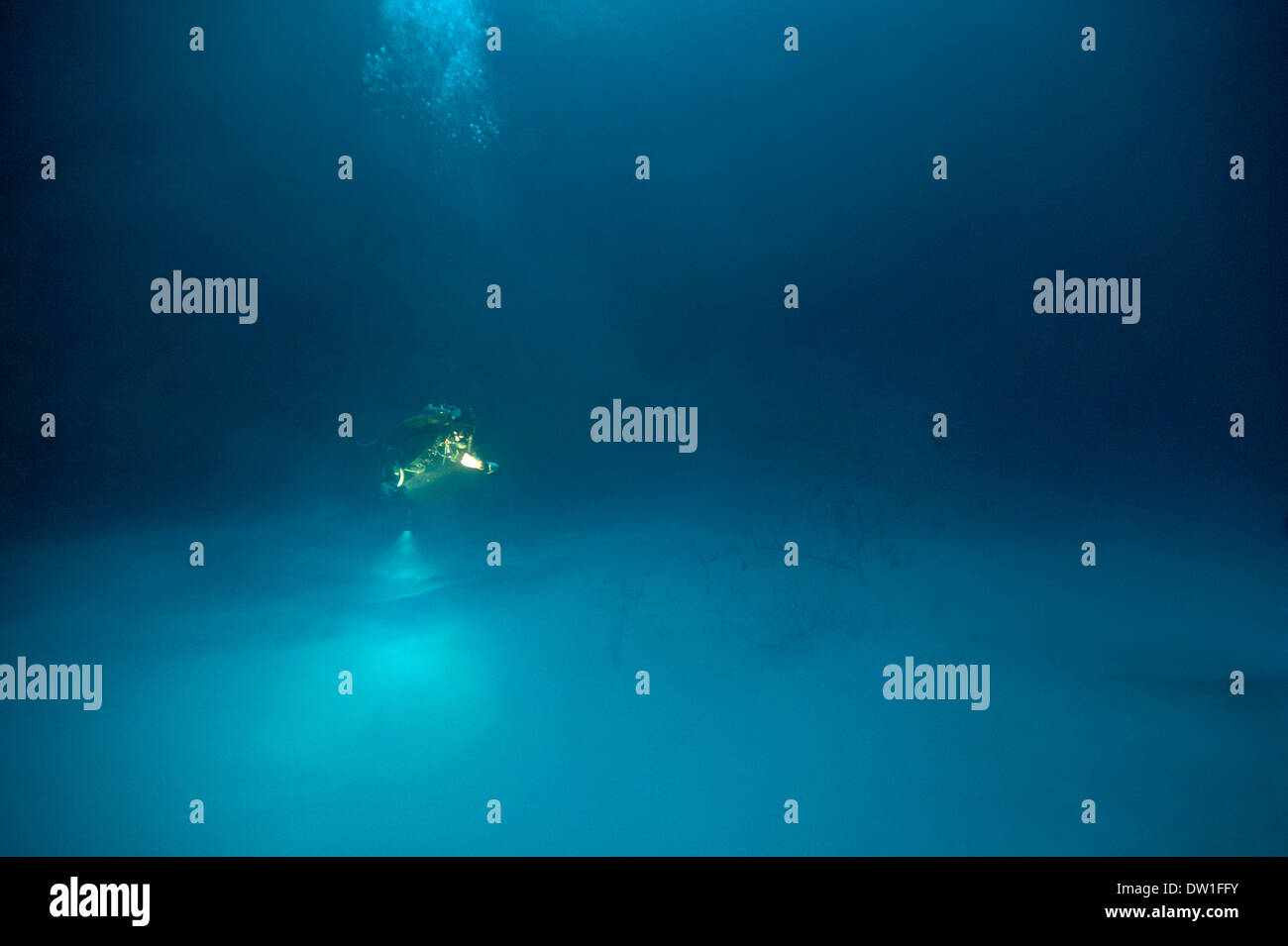 Scuba diver swimming thru the underwater cenote Pit cave, Yucatan ...