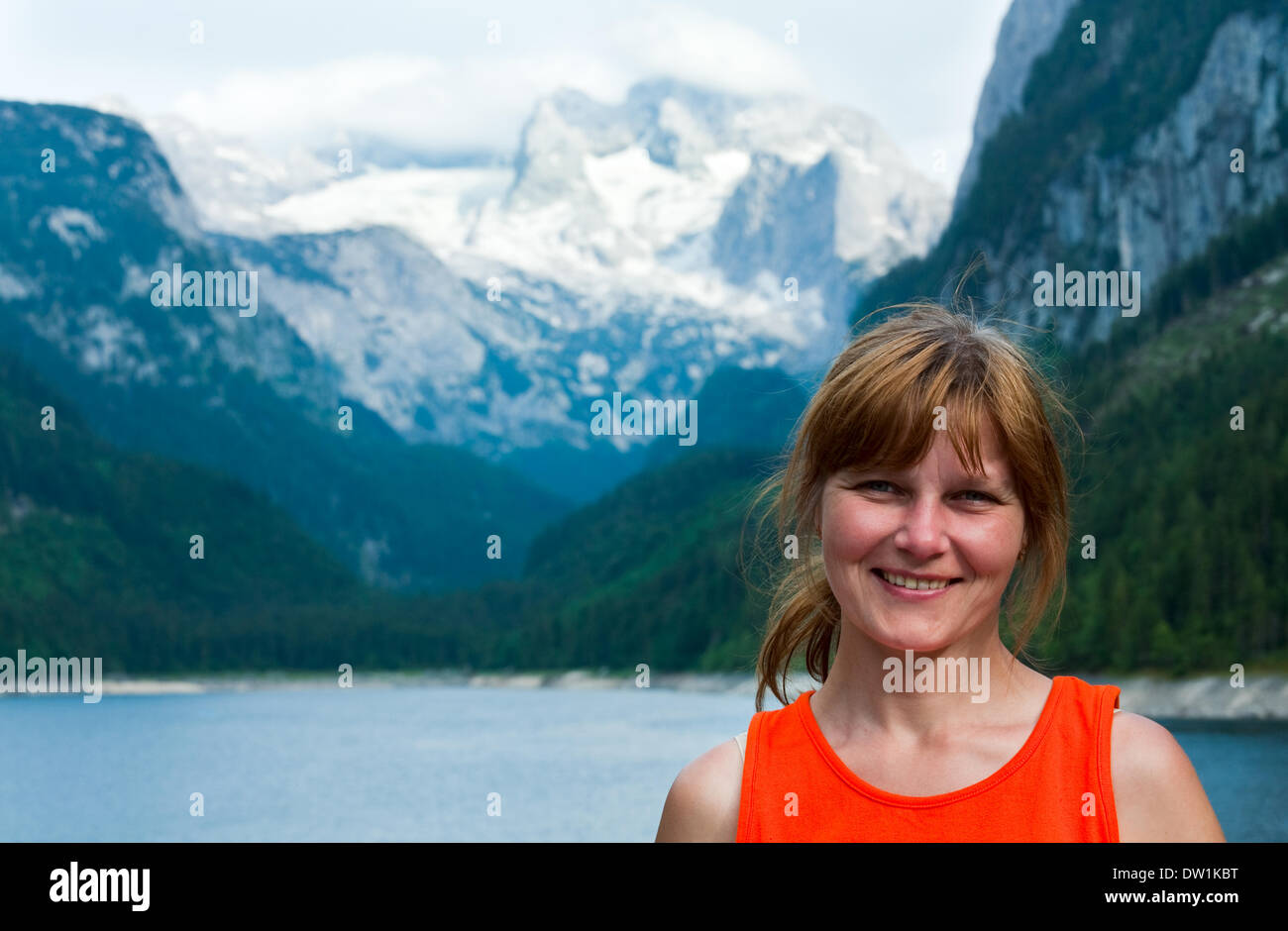 Alpine summer lake and woman portrait Stock Photo - Alamy