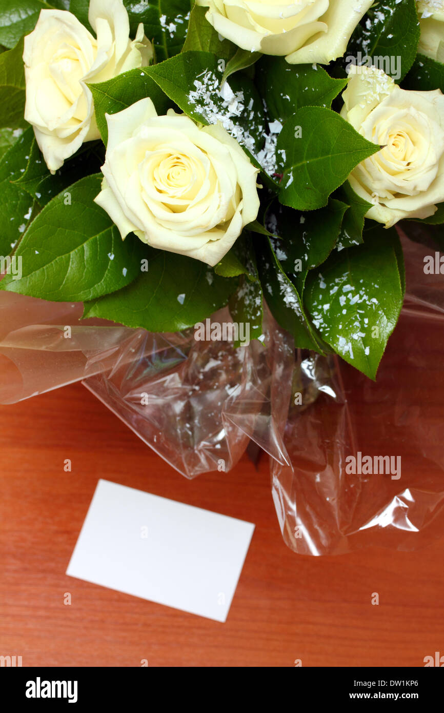 greetings - roses and note Stock Photo - Alamy