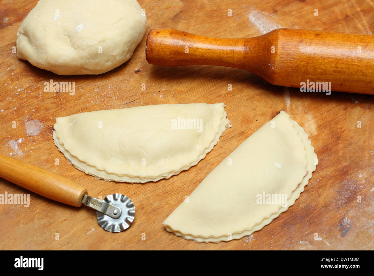rolling-pin with patty and pastry Stock Photo - Alamy