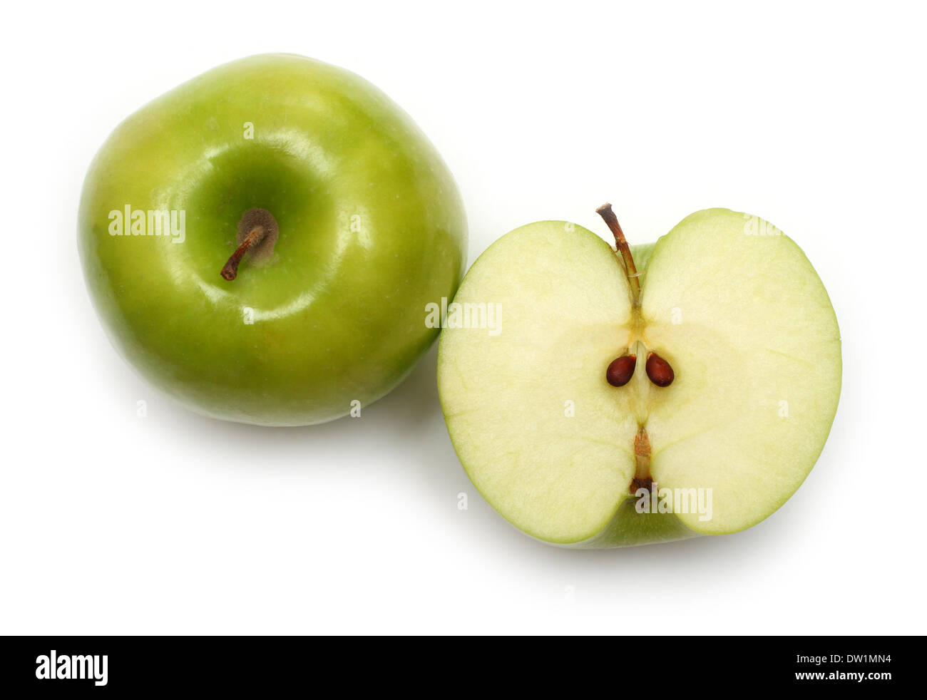 whole and sliced green apples Stock Photo - Alamy