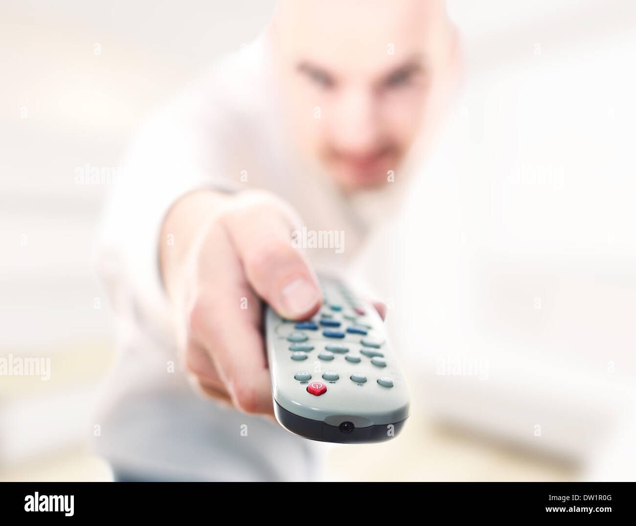 man with remote control Stock Photo - Alamy