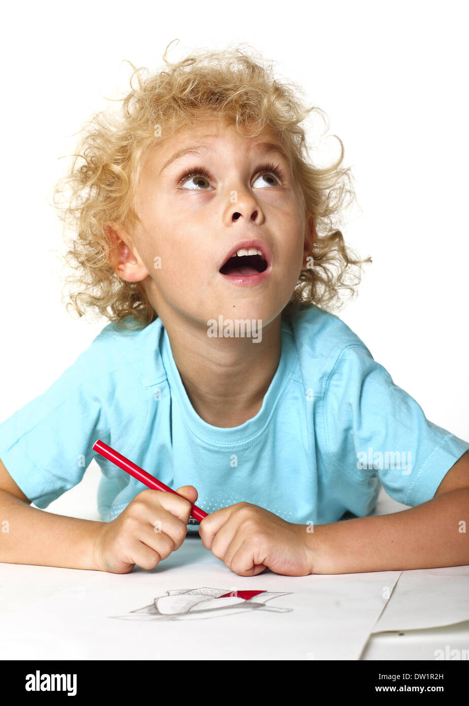 little kid drawing and thinking Stock Photo - Alamy