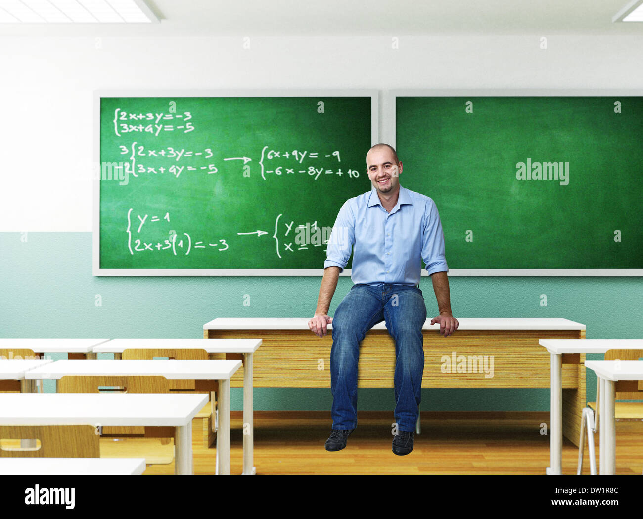 teacher in a classroom Stock Photo - Alamy