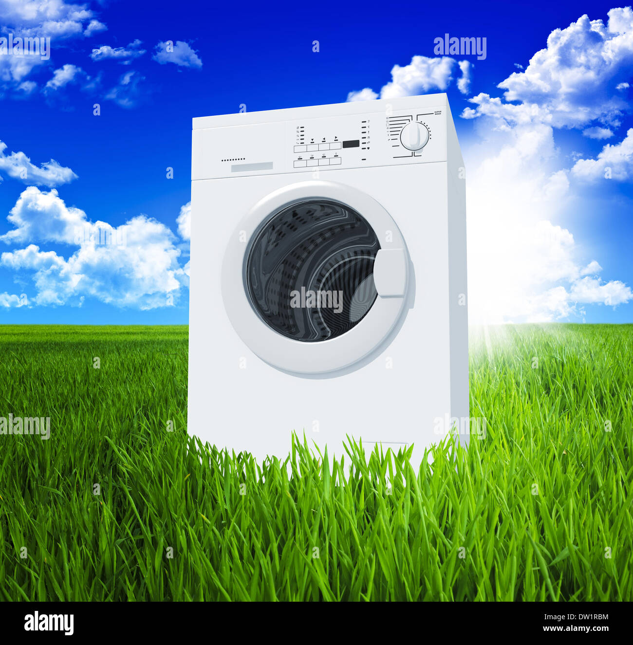 washing machine and green field Stock Photo - Alamy