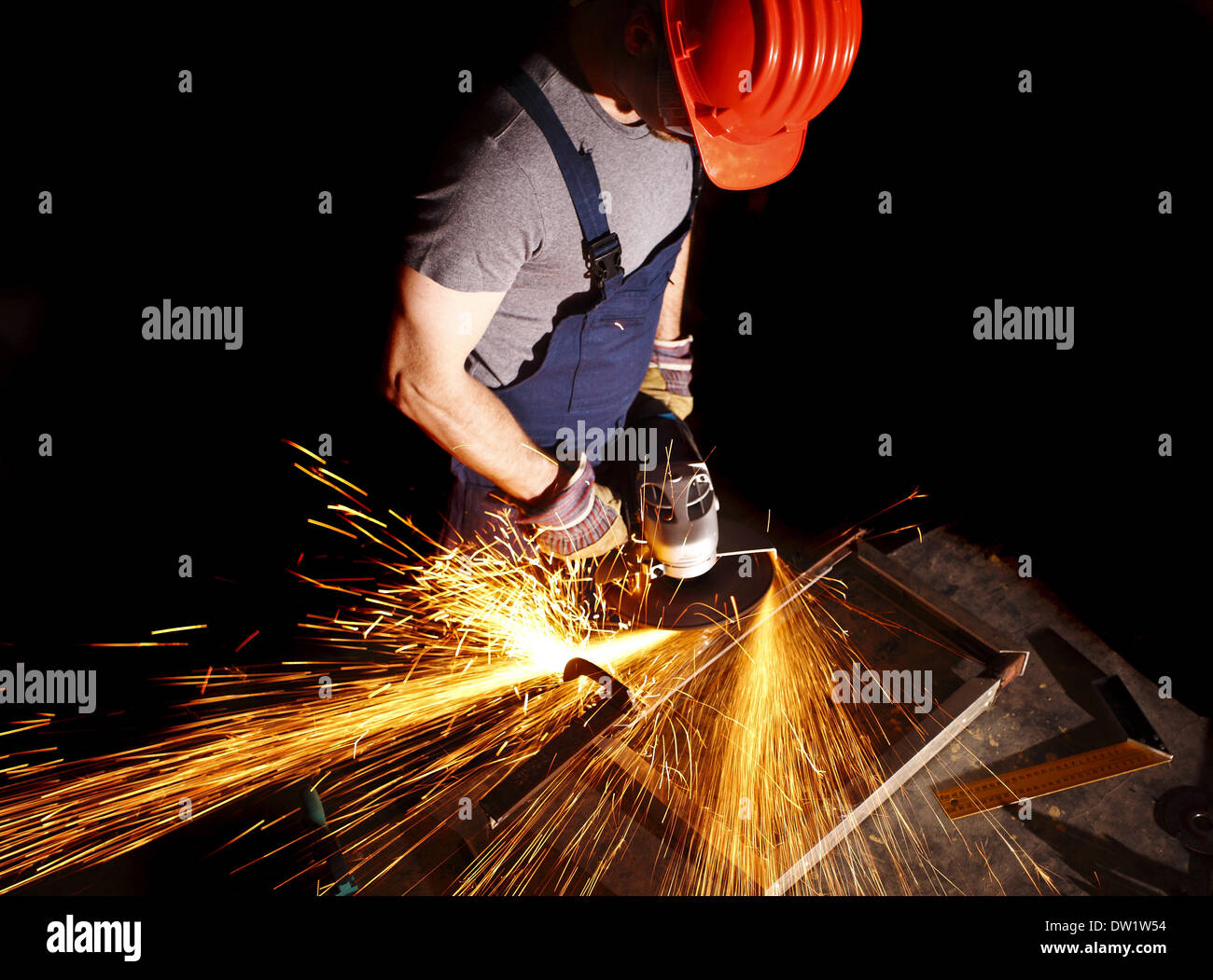 manual worker with grinder Stock Photo - Alamy