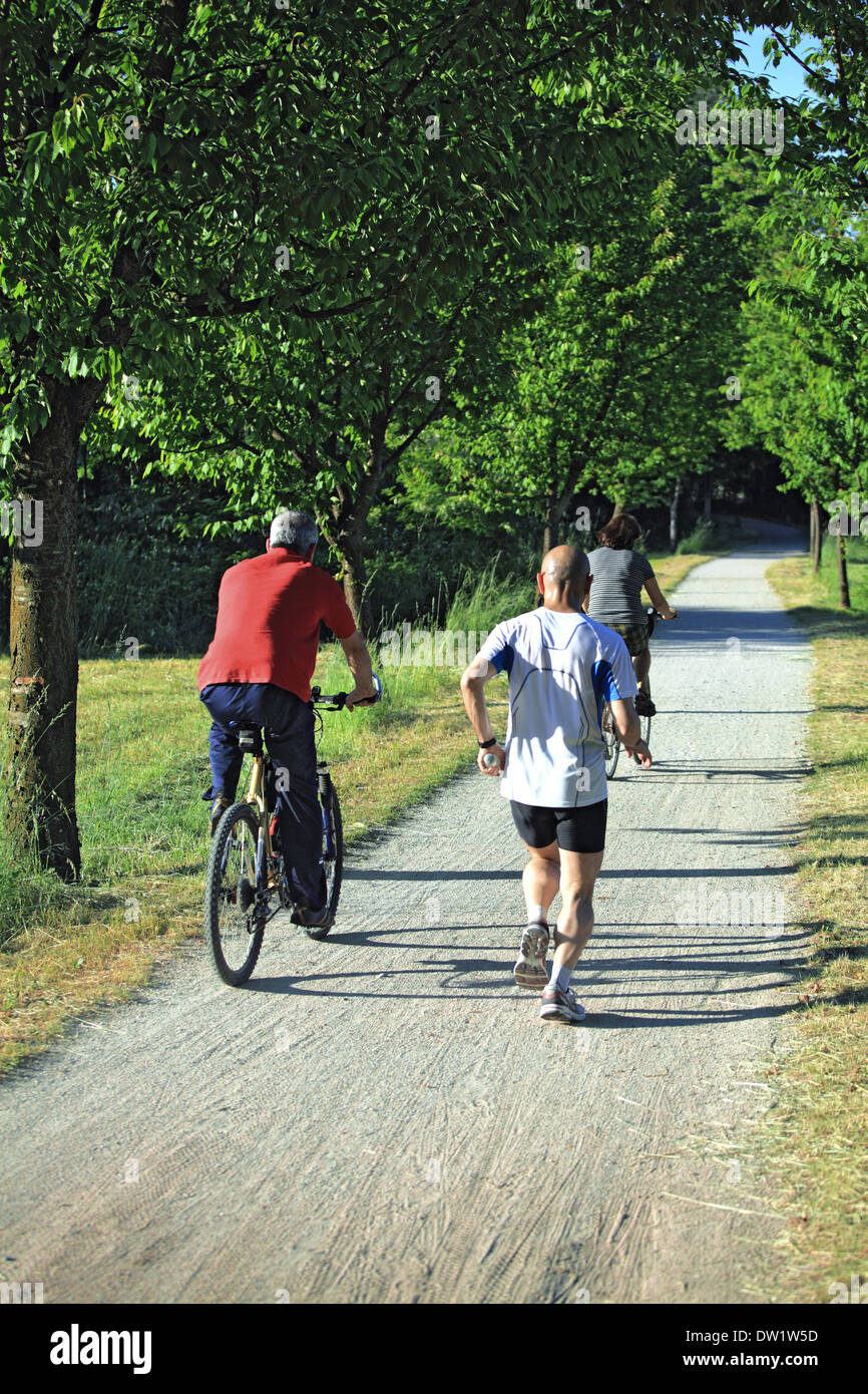 people run in a park Stock Photo - Alamy