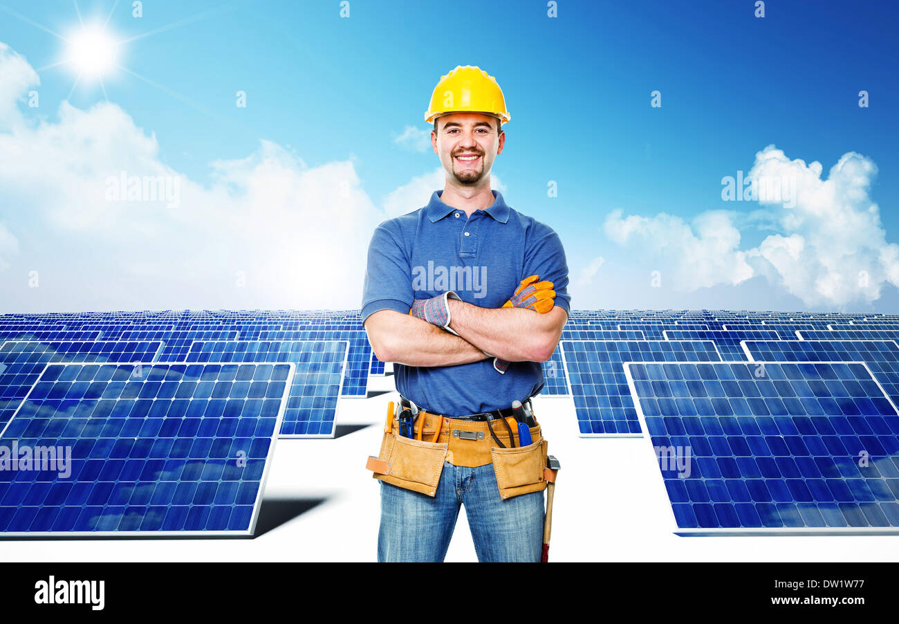 smiling worker and solar power Stock Photo - Alamy