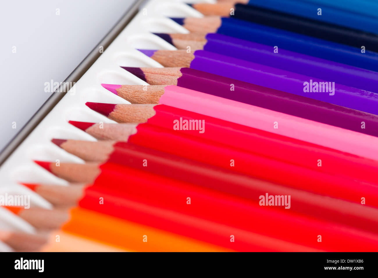 many colored pencils in a row Stock Photo - Alamy
