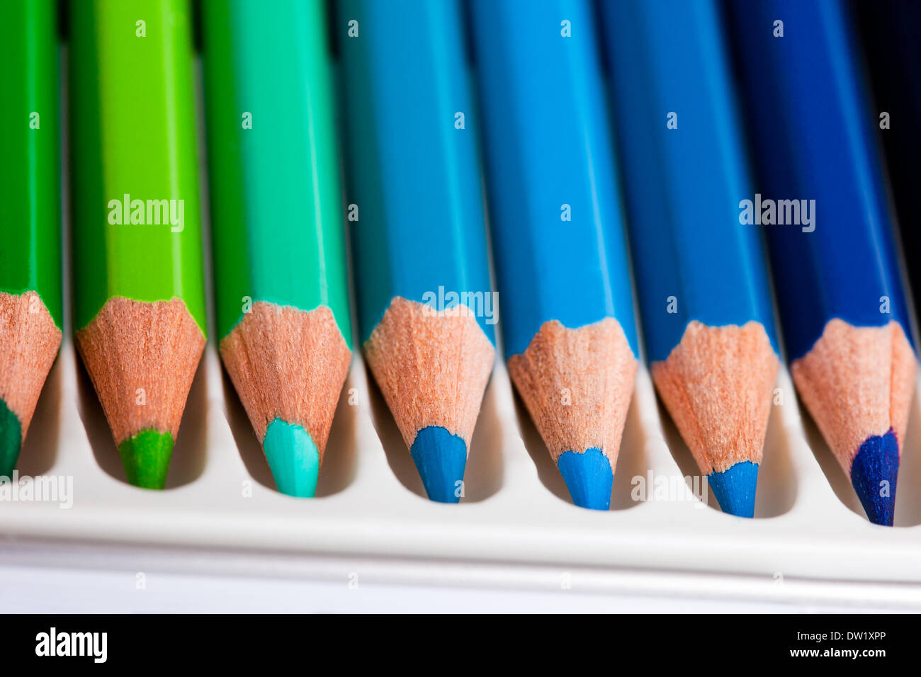 many colored pencils in a row Stock Photo - Alamy