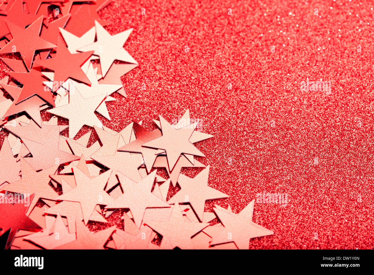 festive stars on red background Stock Photo - Alamy