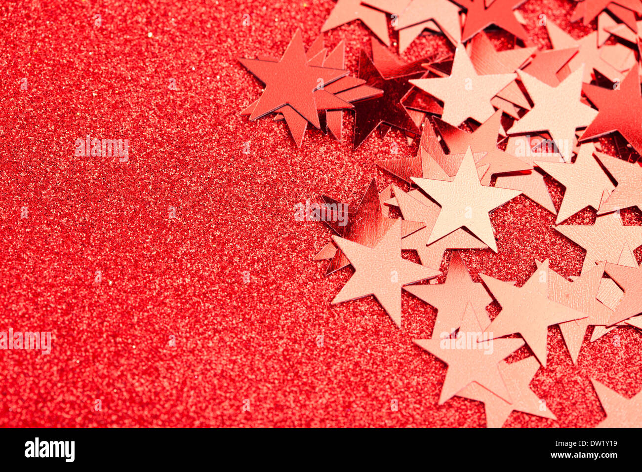 festive stars on red background Stock Photo - Alamy