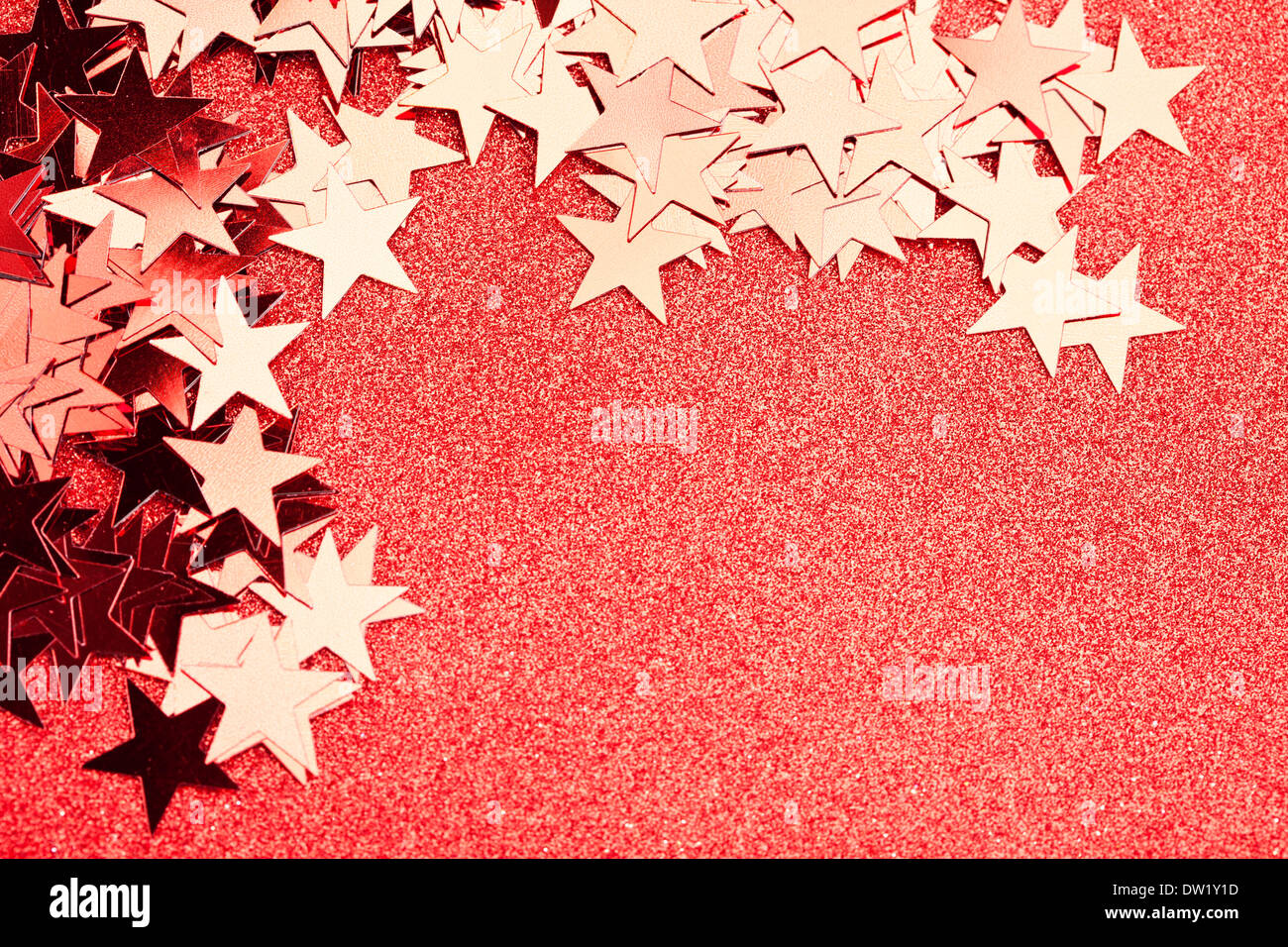 festive stars on red background Stock Photo - Alamy