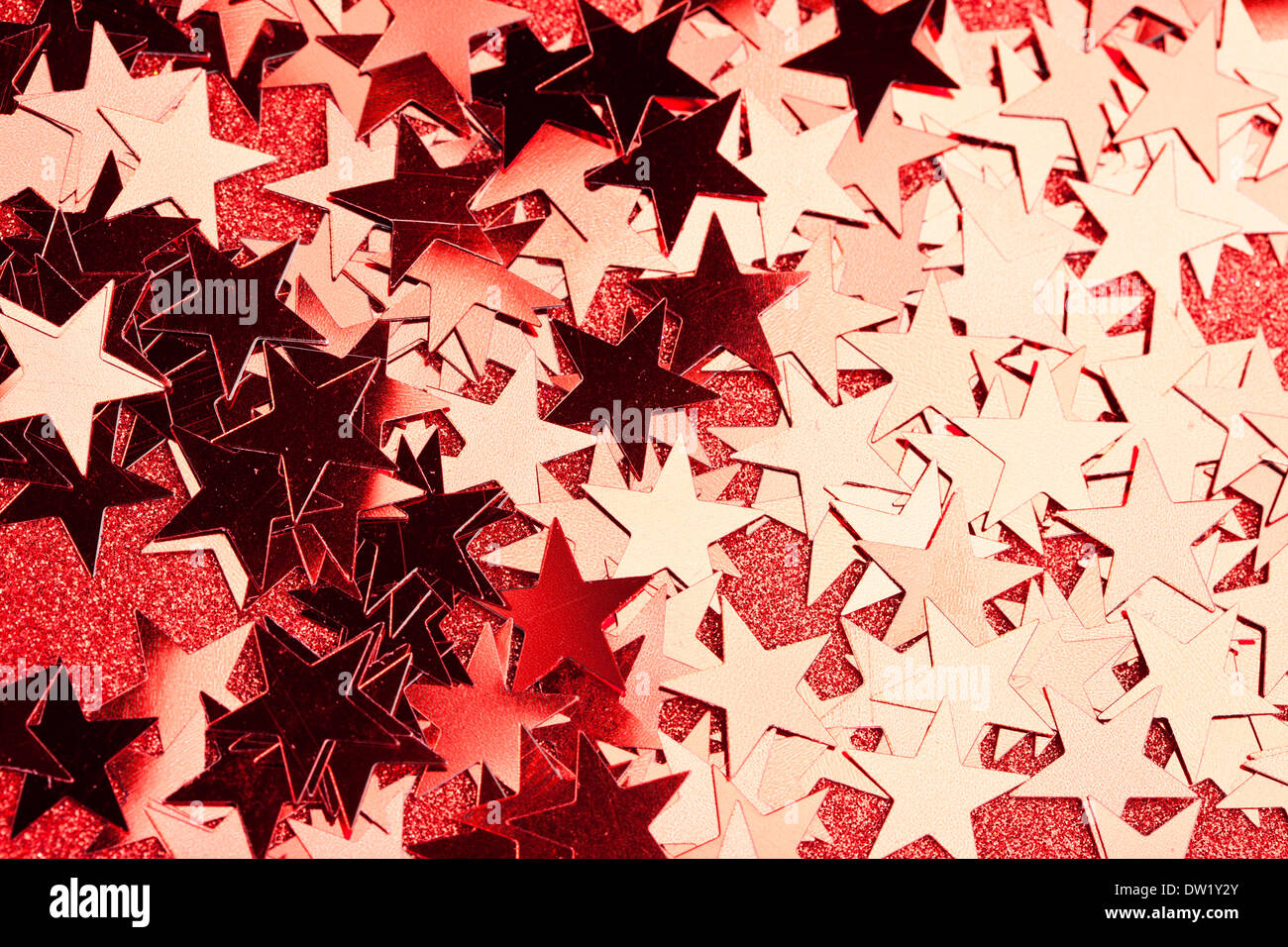 festive stars on red background Stock Photo - Alamy