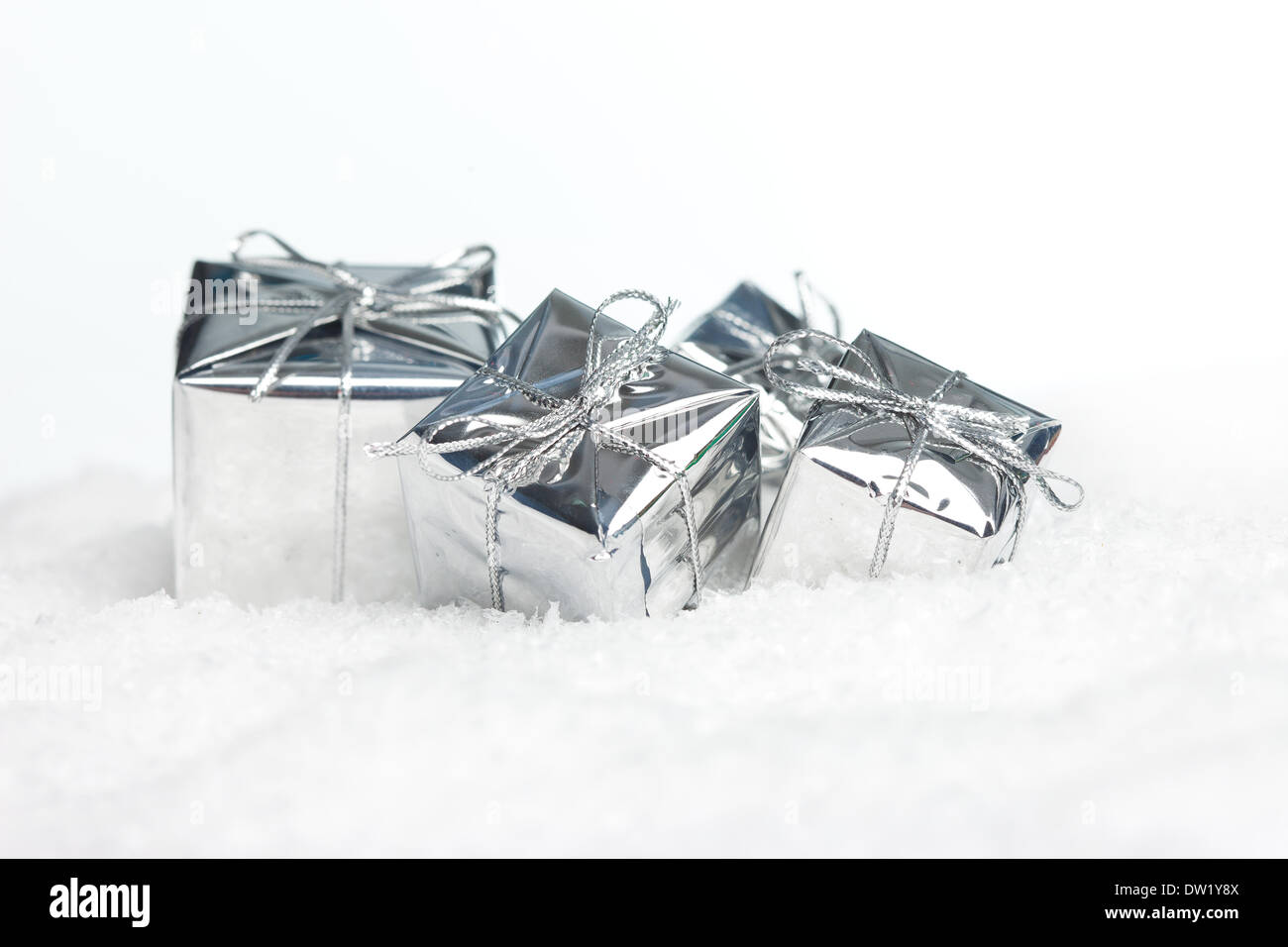 Many silver gift boxes hi-res stock photography and images - Alamy