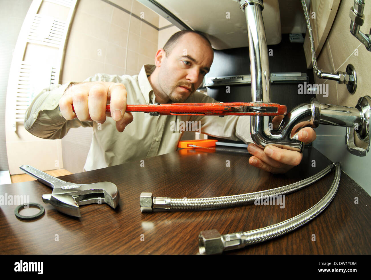 Plumber at work hi-res stock photography and images - Alamy