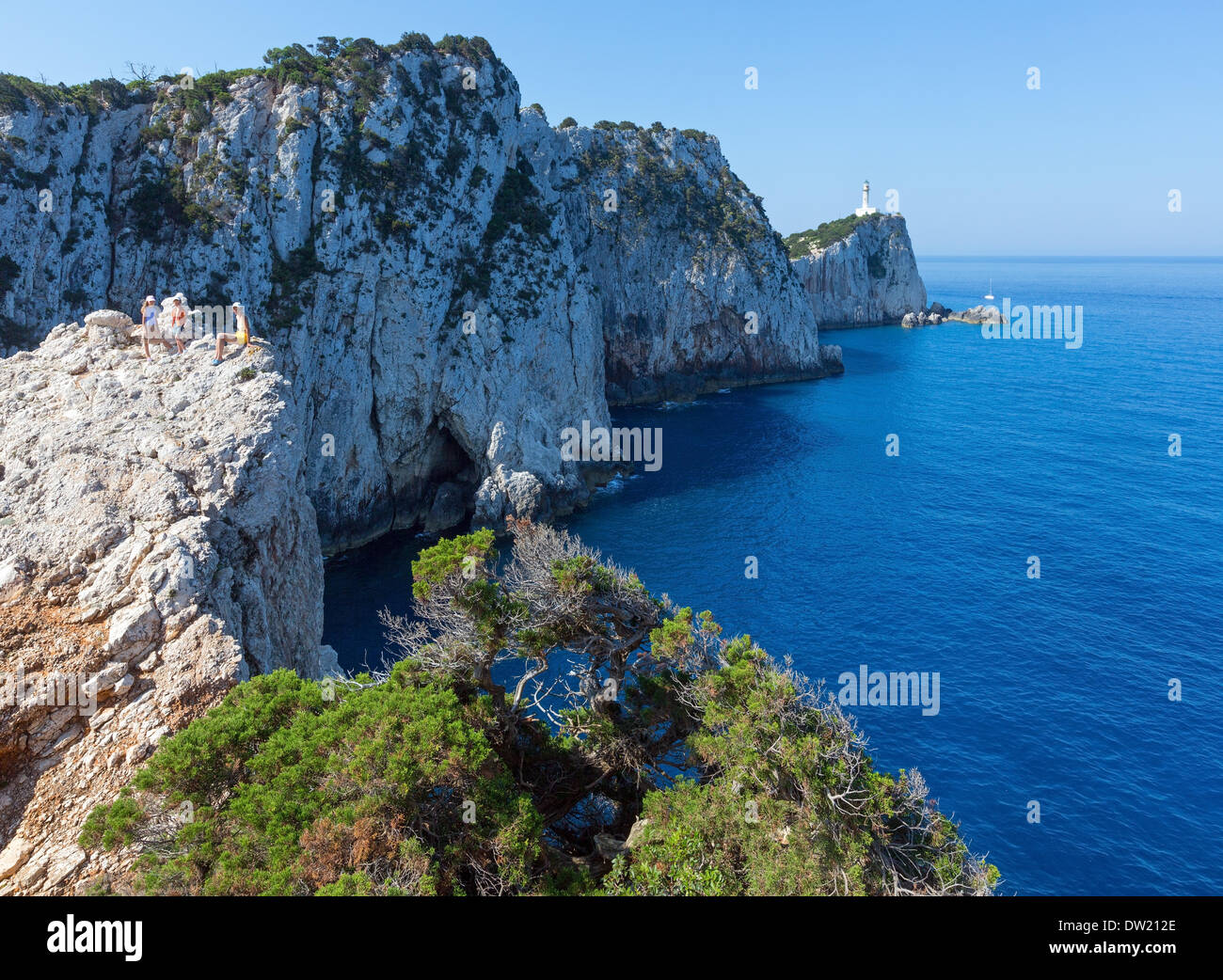 Family on Rocky cape Stock Photo - Alamy