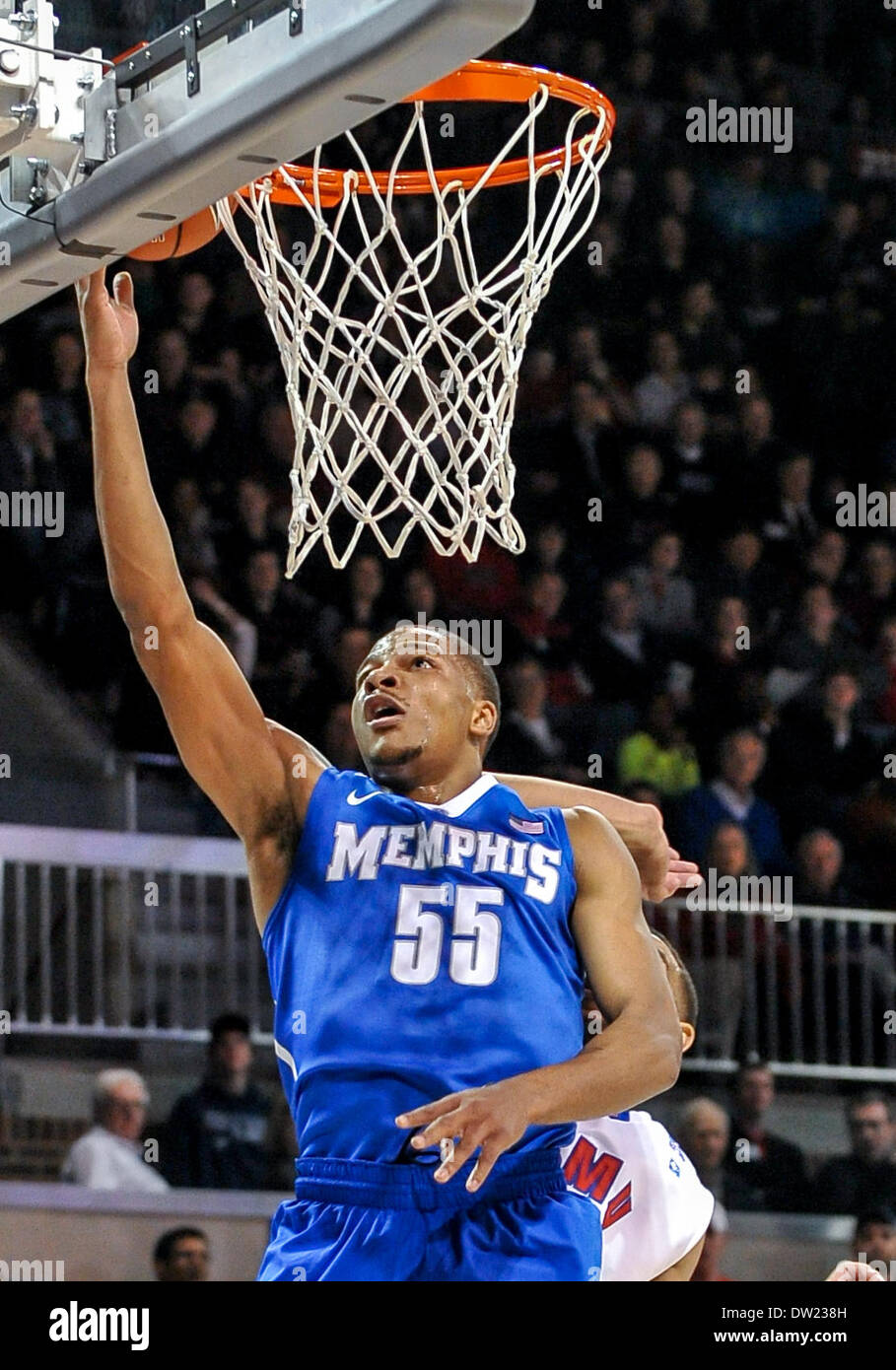 Memphis Tigers guard Geron Johnson (55) gets a rebound as he is ...