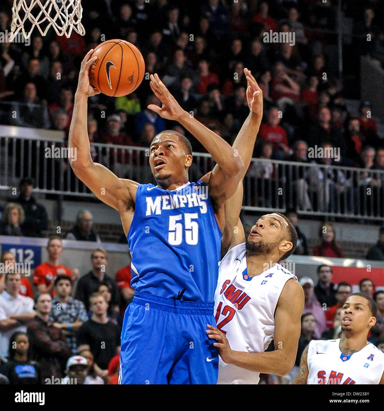 Memphis Tigers guard Geron Johnson (55) gets a rebound as he is ...