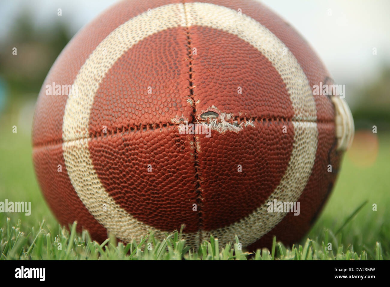A close up photograph of a tattered American Football Stock Photo - Alamy
