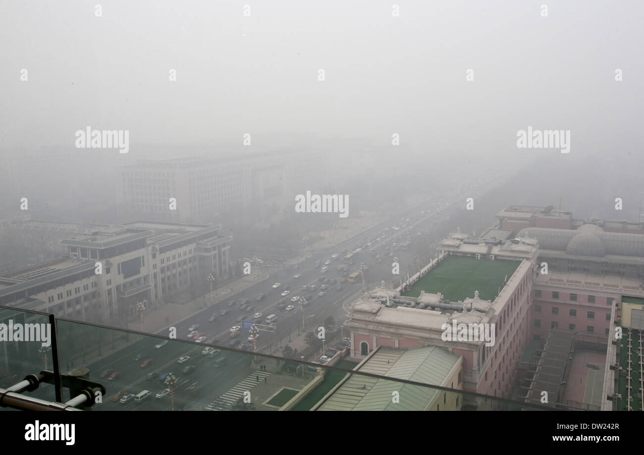 Beijing, China. 26th Feb, 2014. Buildings and streets are shrouded by ...