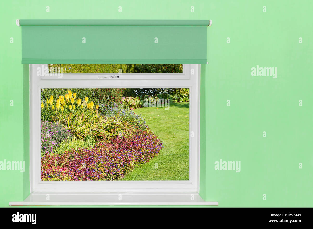 View of flower garden and grass from window Stock Photo - Alamy