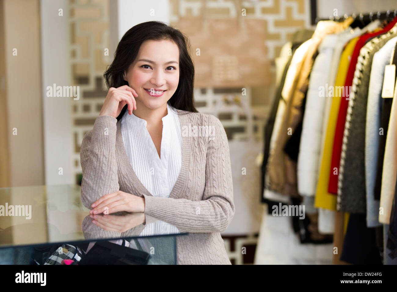 Clothing store owner Stock Photo - Alamy